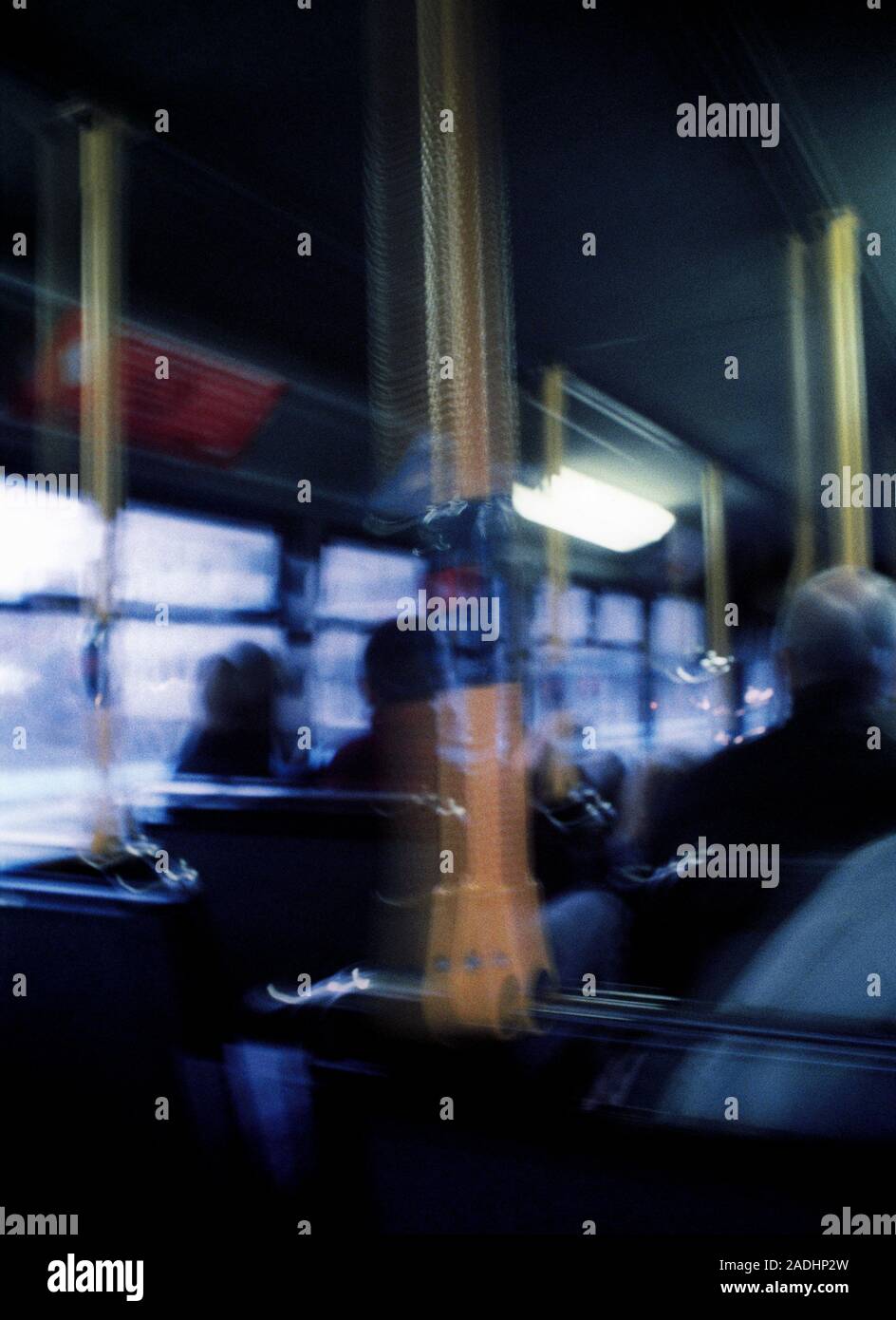 Agoraphobia, conceptual image. People sitting on a bus, from the ...