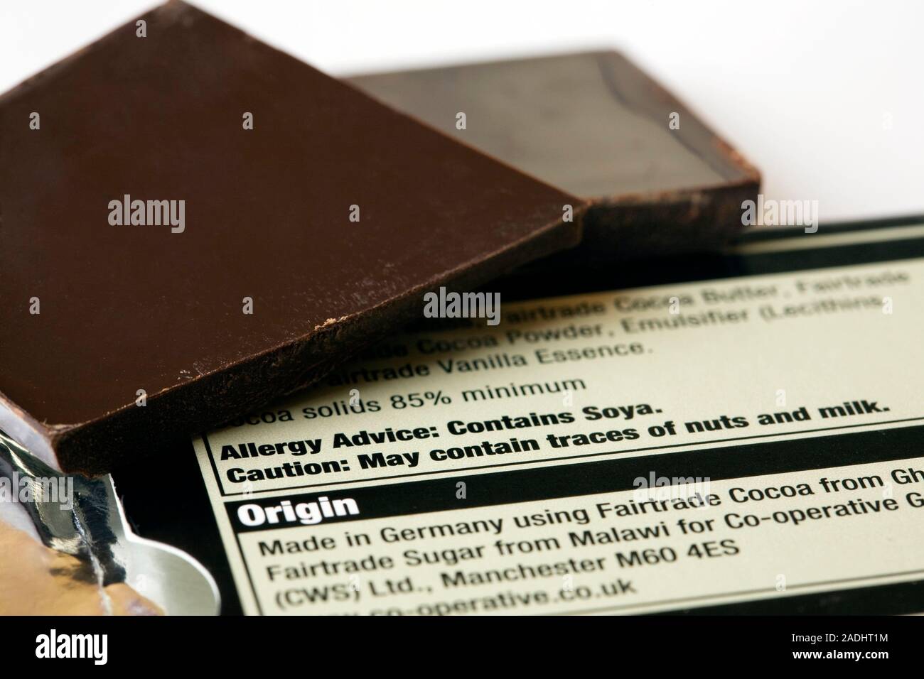 Food allergy advice. Chocolate pieces and packaging. A label on the ...