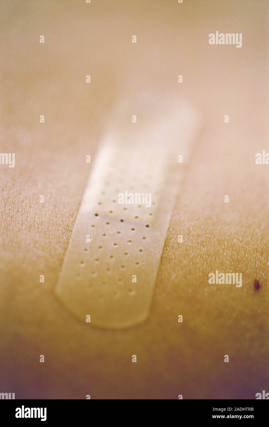 Sticking plaster covering a skin wound Stock Photo - Alamy