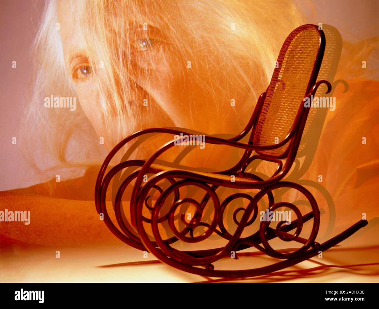 Aging. Conceptual image depicting aging, in which an elderly woman's ...