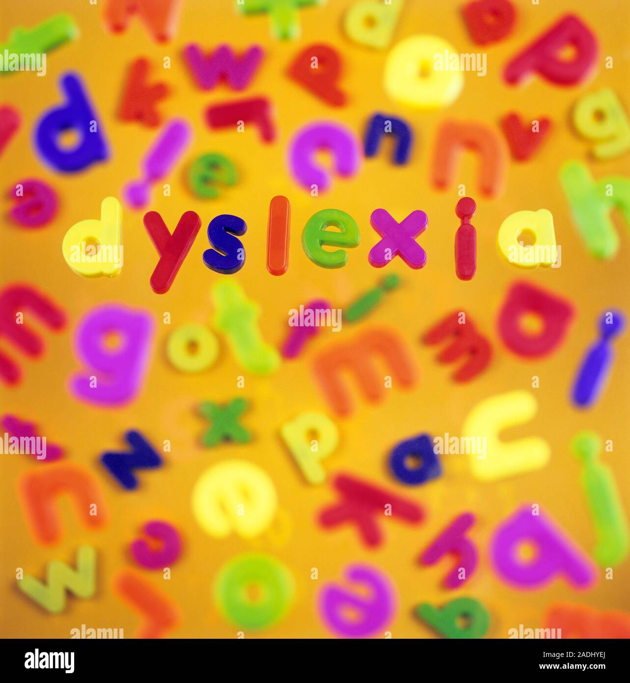 Dyslexia. Plastic magnets spelling the word dyslexia. Dyslexia is a ...