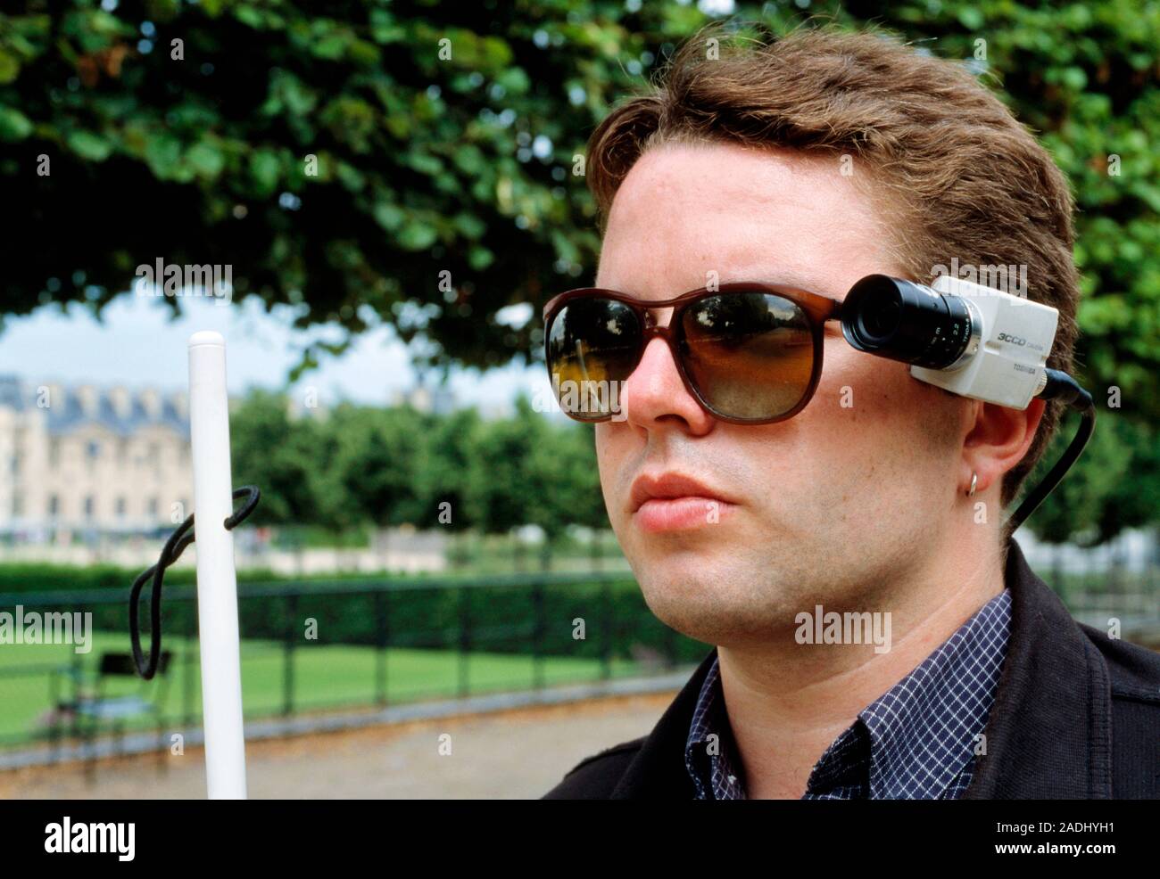 Visual system for the blind. Blind man using the TVSS (Tactile Vision ...
