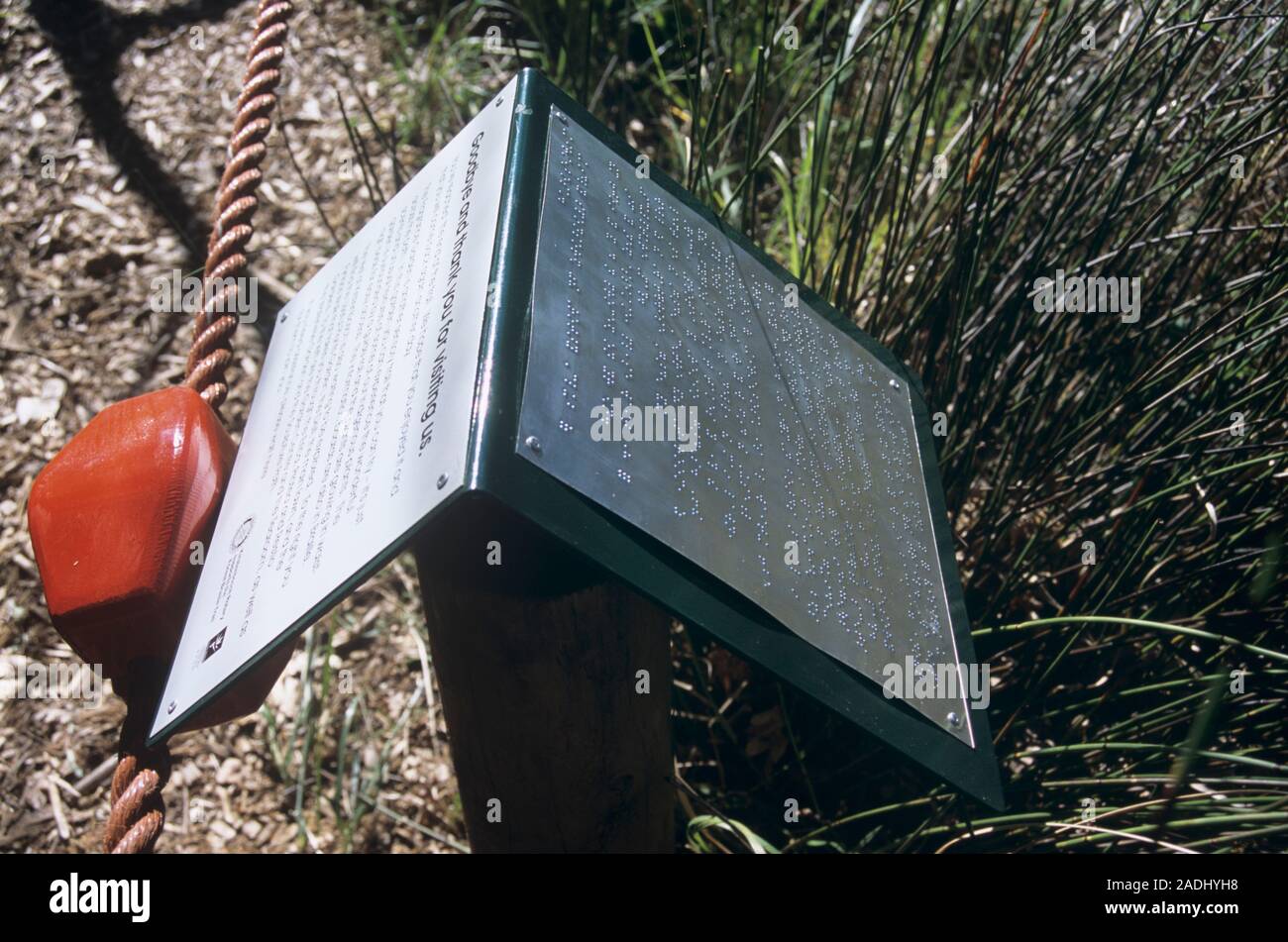 Braille sign in a public garden. The braille writing and reading system ...