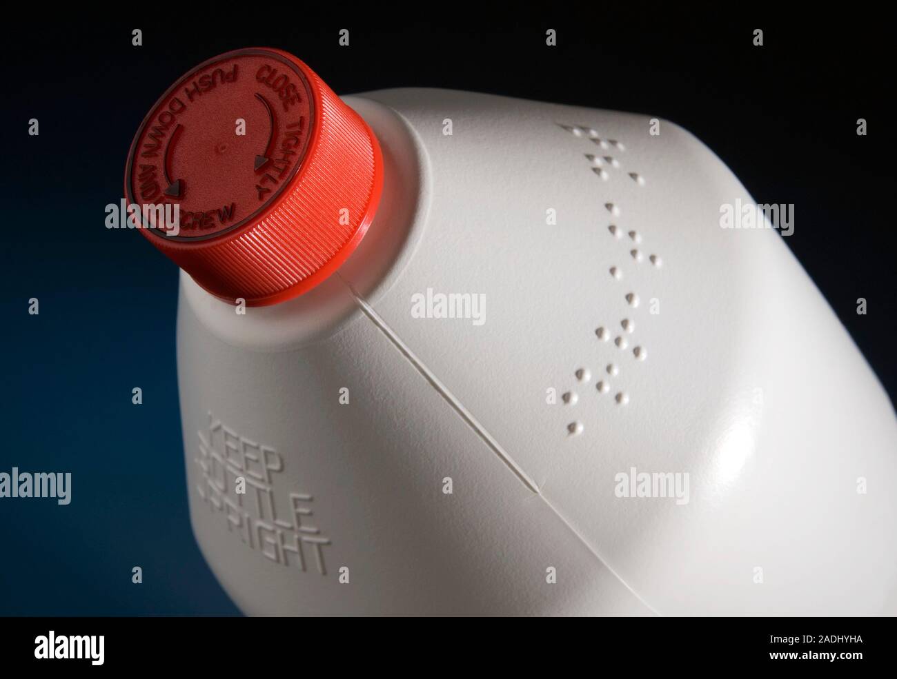 Braille and raised letters on a plastic bleach bottle. Raised letters ...