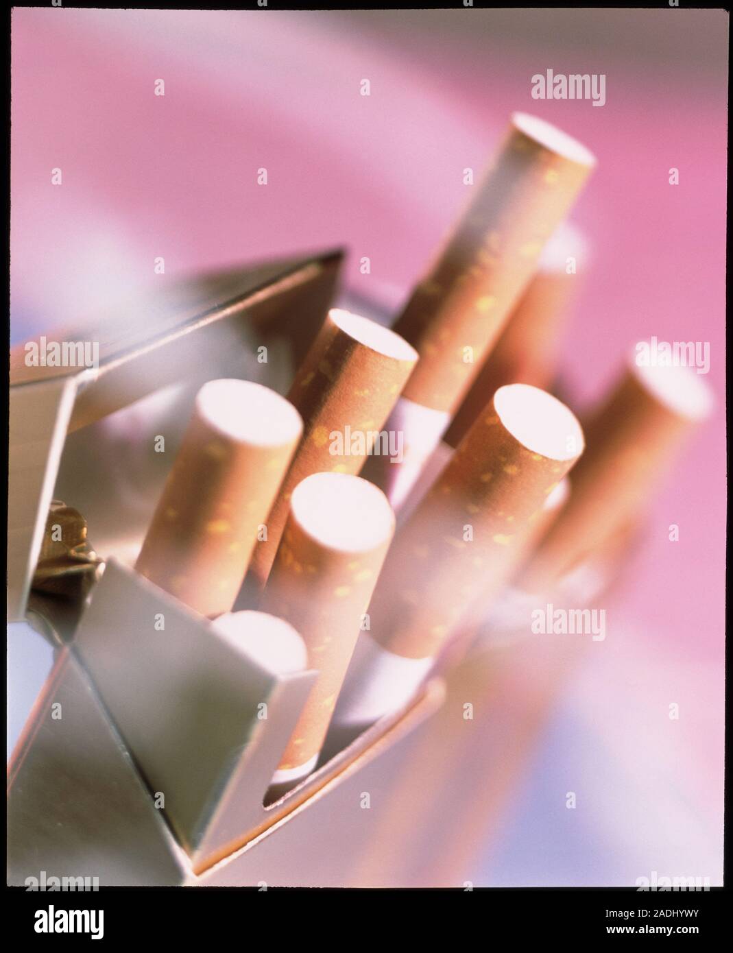 Cigarette packet. View of a packet of cigarettes seen through a haze of ...