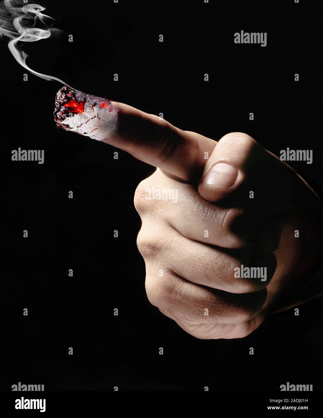 Smoking finger. Conceptual image of a smoking ash- tipped finger ...