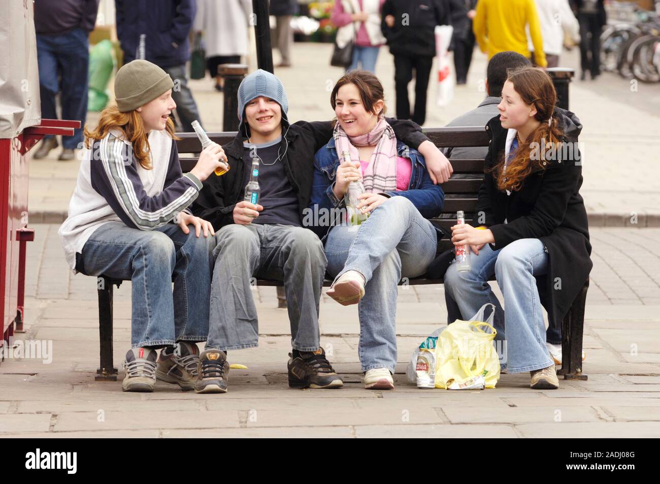 MODEL RELEASED. Underage drinking. Group of teenagers drinking on a ...