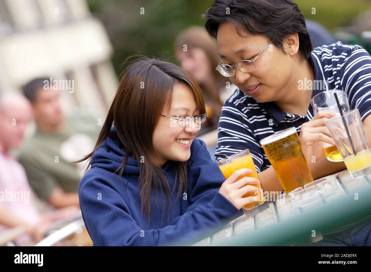 Social drinking. Man and woman drinking alcoholic and non-alcoholic ...