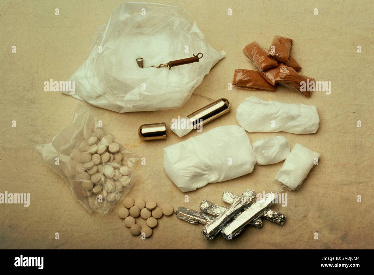 Seized drugs. Assortment of illegal drugs seized by customs officers ...