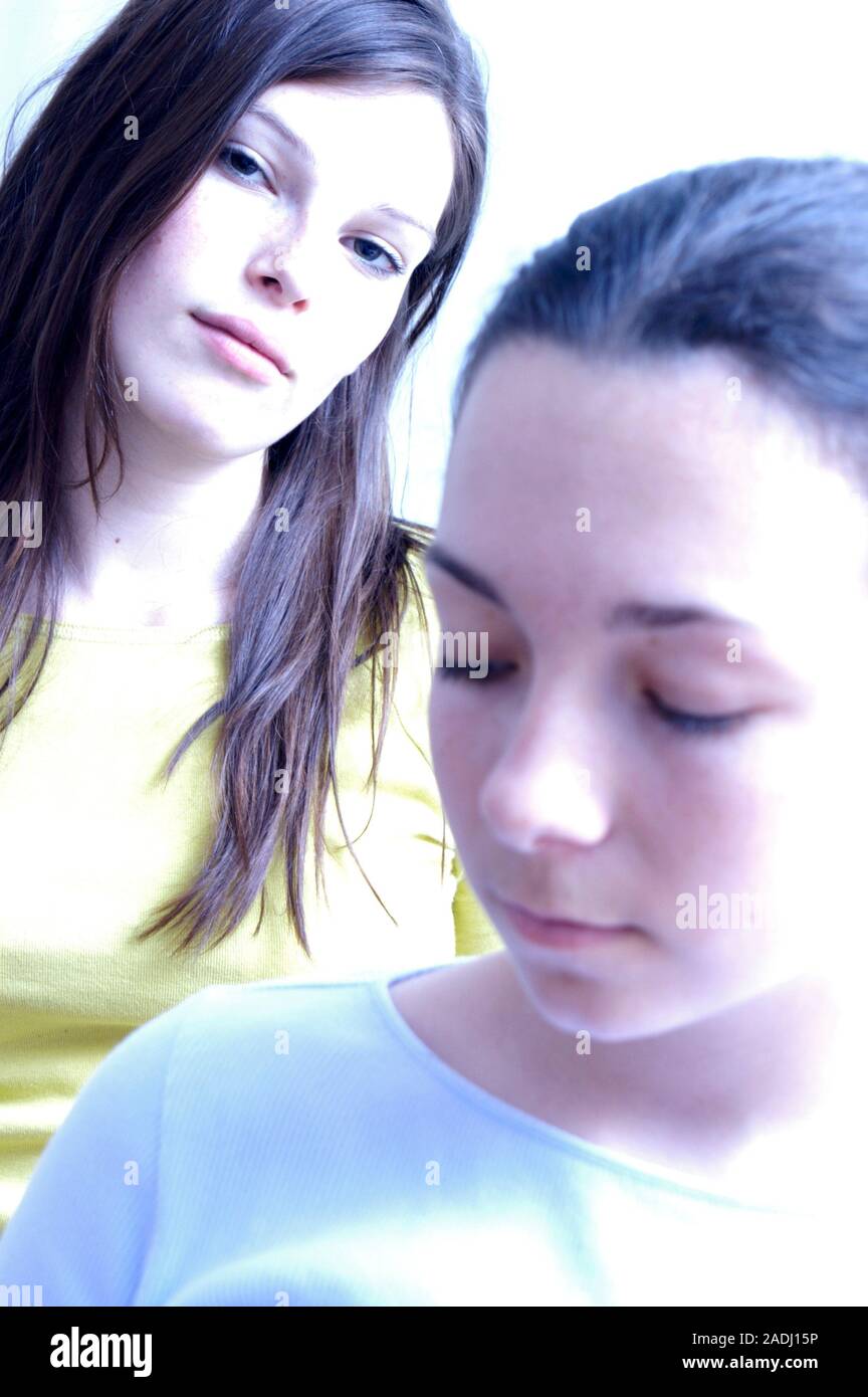 MODEL RELEASED. Unhappy girls. Two girls looking unhappy Stock Photo ...