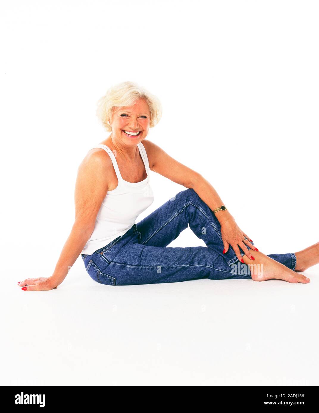 Happy 62 year old woman Stock Photo - Alamy