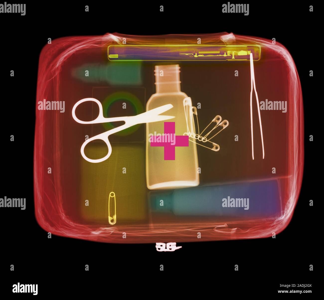 First aid kit. Coloured X-ray of a first aid kit in a carrying ...