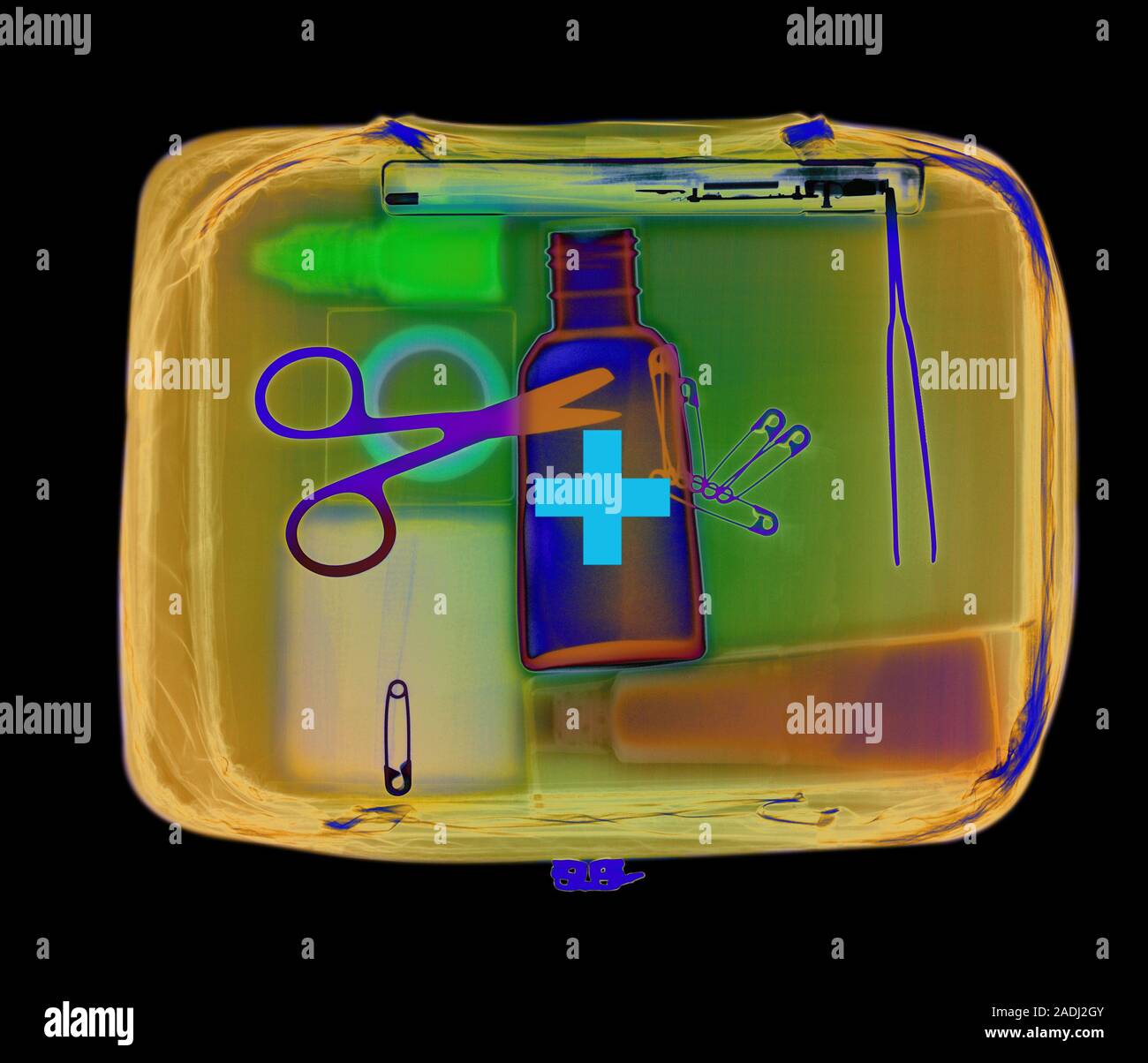 First aid kit. Coloured X-ray of a first aid kit in a carrying ...
