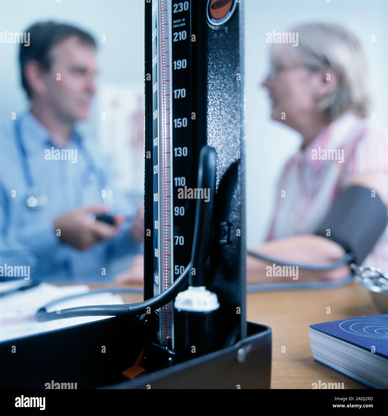 Blood pressure gauge, also known as a sphygmomanometer. A cuff (black ...