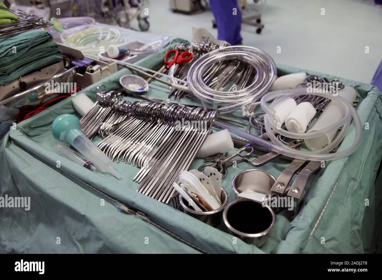 Surgical instruments in a tray ready for use. Many sizes of forceps are ...