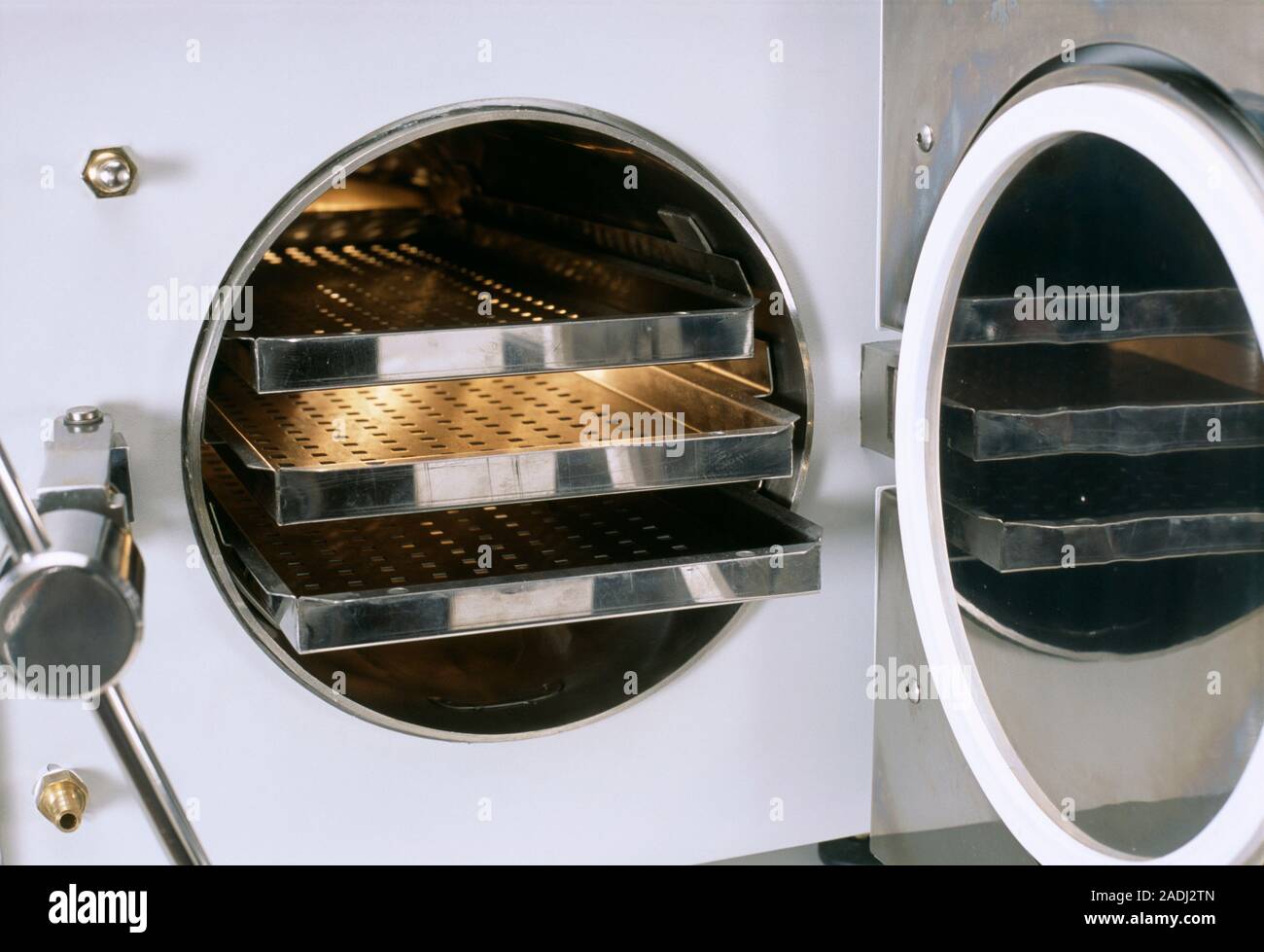 Autoclave oven. Open door and interior of an autoclave oven. Medical or ...