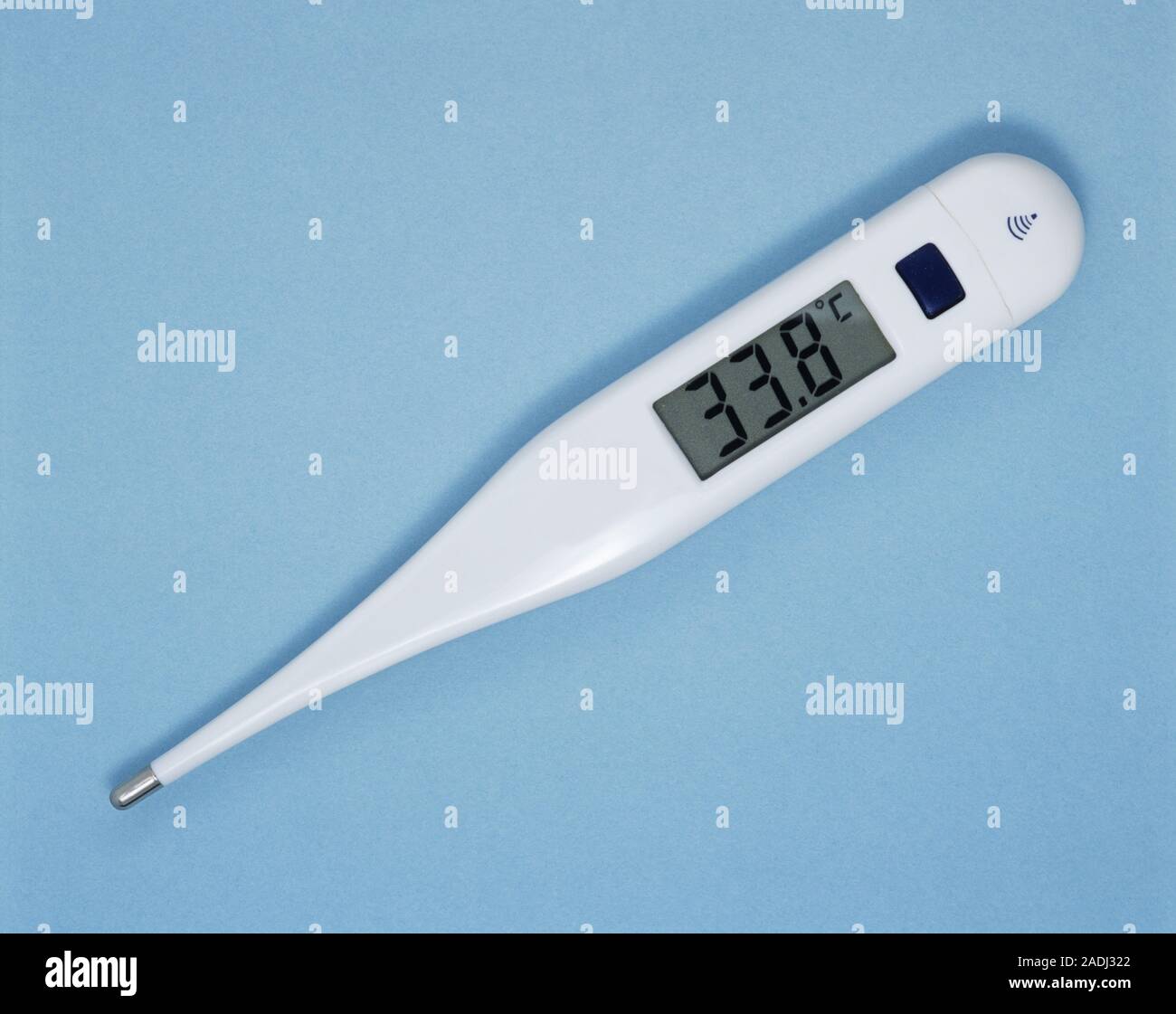 Hypothermia. Digital thermometer showing an lowered temperature of 33.8 ...
