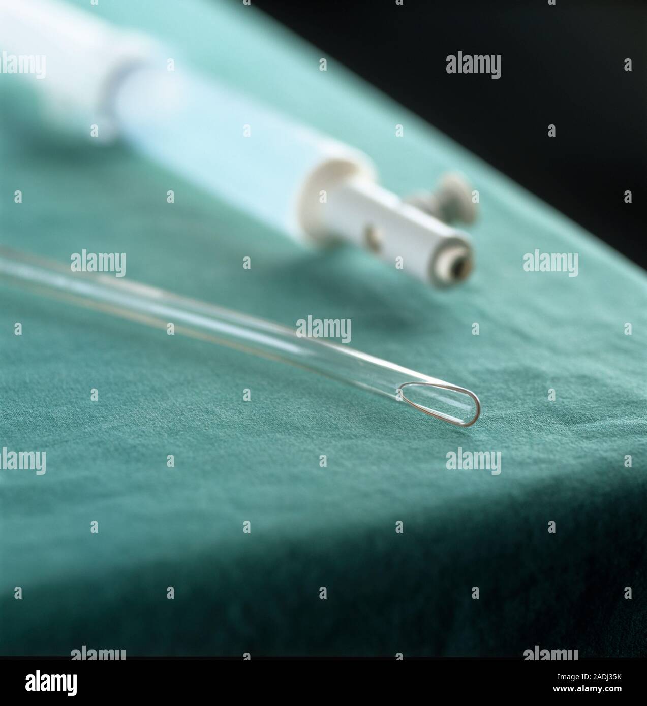 Manual vacuum abortion equipment. Manual vacuum aspirator (top) and ...