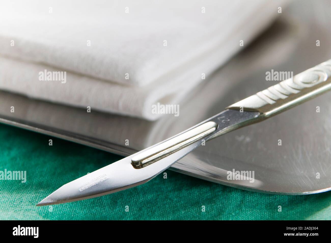 Scalpel on a stainless steel tray Stock Photo - Alamy