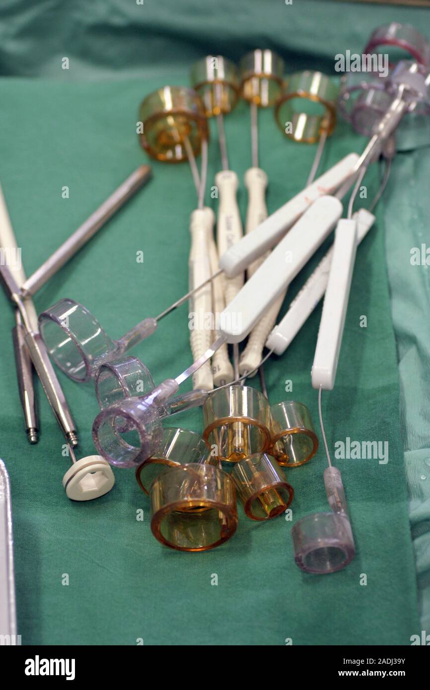 Heart valve sizers on a tray in an operating theatre. The tools are ...