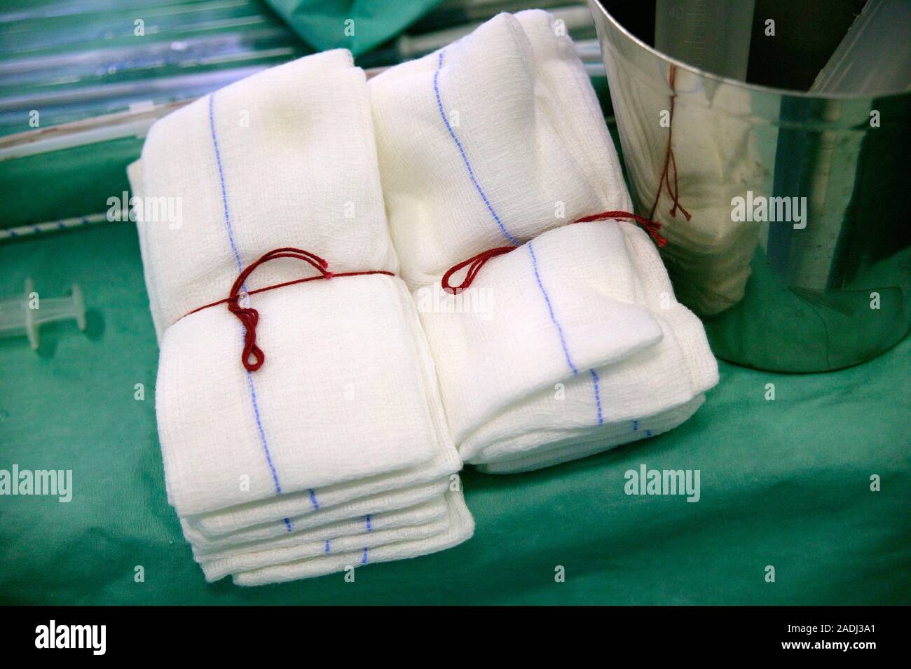 Surgical swabs. Two bundles of unused surgical swabs Stock Photo - Alamy