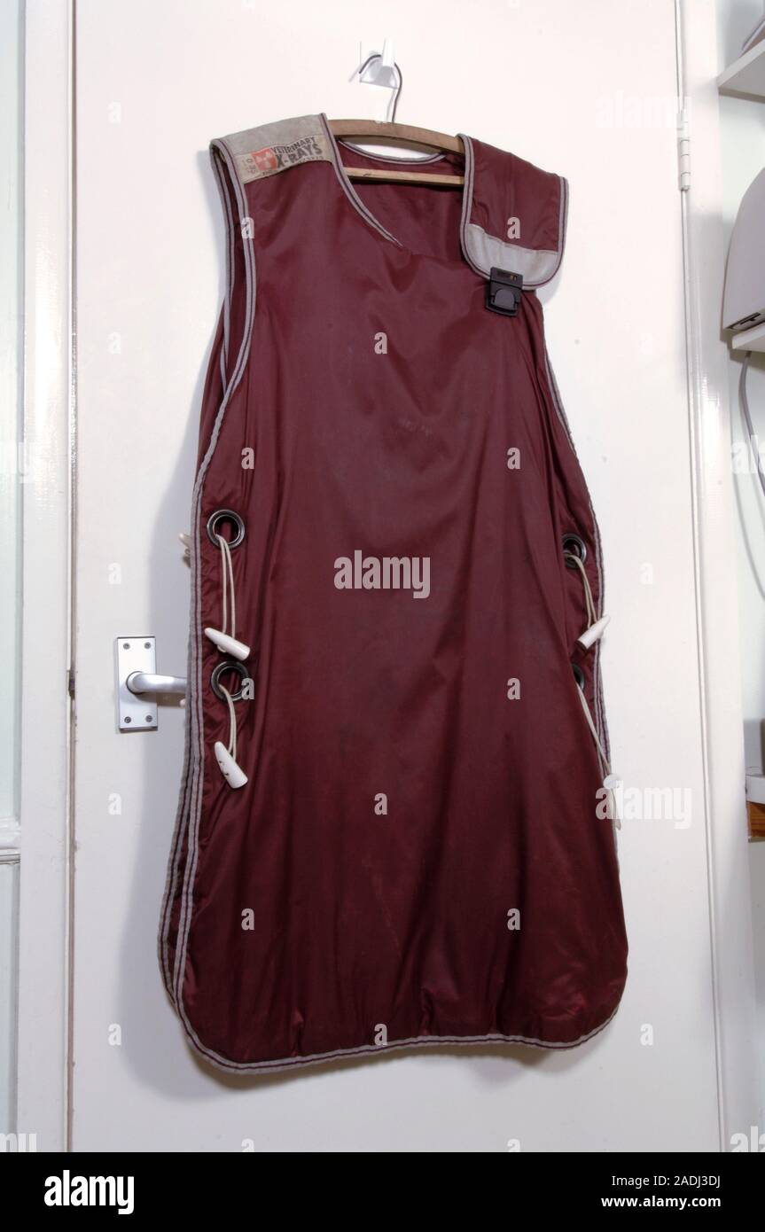 Lead apron hanging on the back of a door in a radiology department ...