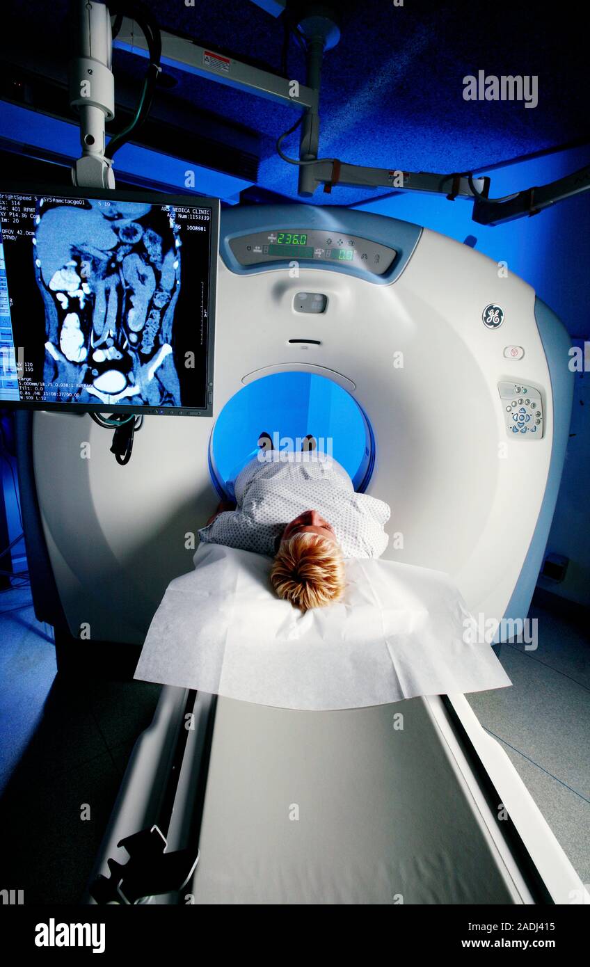 CT scanning. Patient undergoing a CT scan. Computed tomography (CT ...