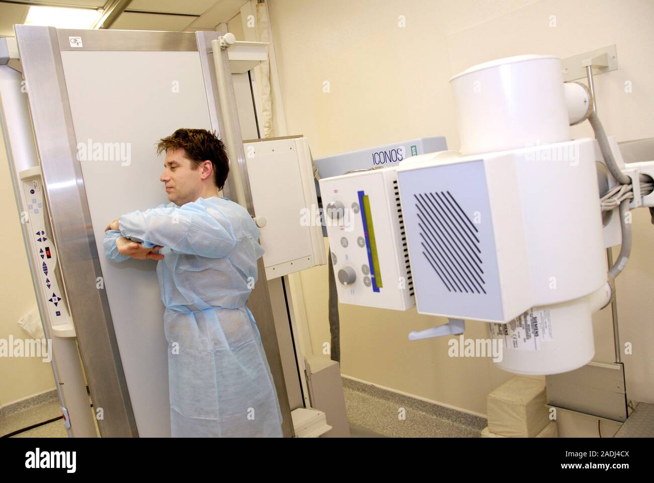 MODEL RELEASED. Chest X-ray. Patient undergoing a chest X-ray. Chest X ...