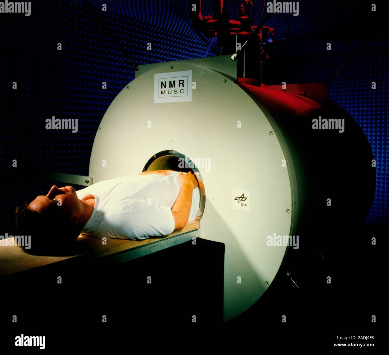 NMR body scanner. A subject inside a Nuclear Magnetic Resonance (NMR) body scanner. NMR imaging ...