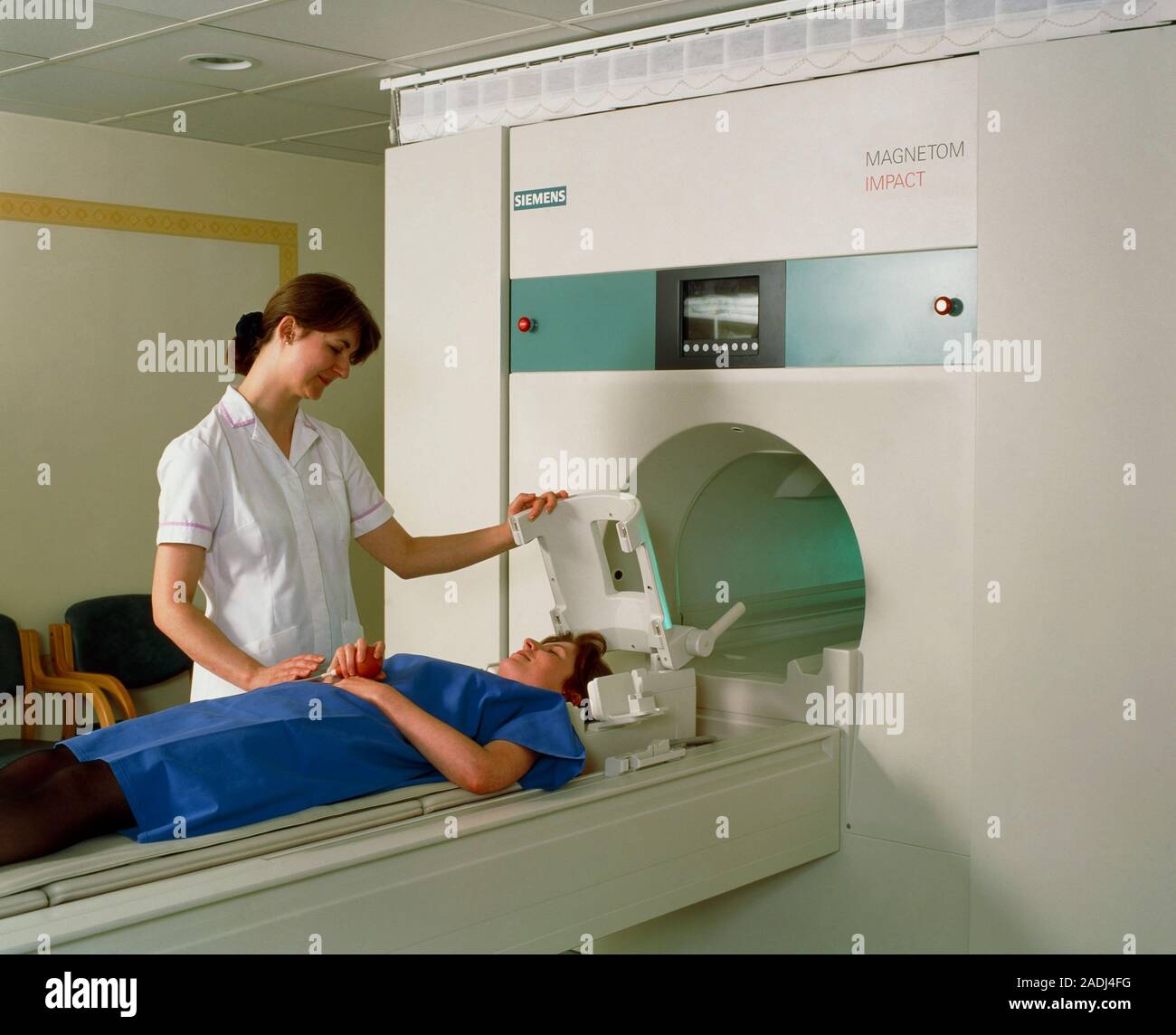 MRI scanning. A patient is prepared for an MRI (magnetic resonance ...