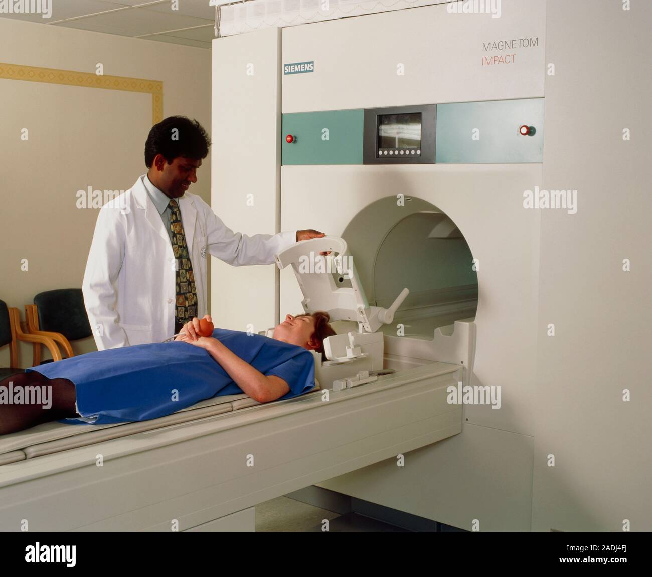 MRI scanning. A patient is prepared for an MRI (magnetic resonance ...