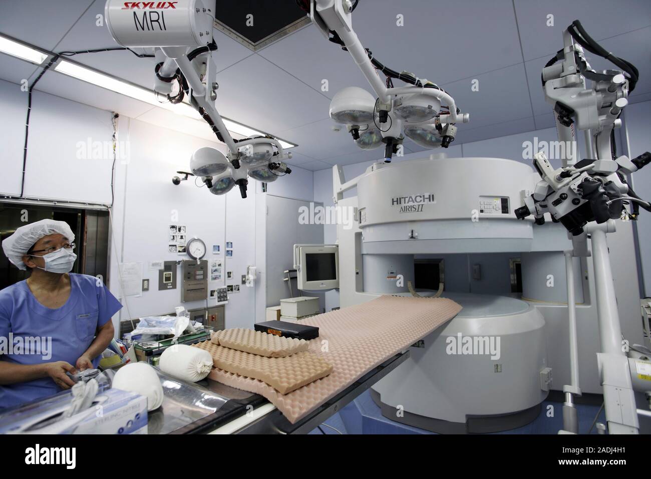 MRI surgery equipment. Surgeon using a remote control to prepare ...