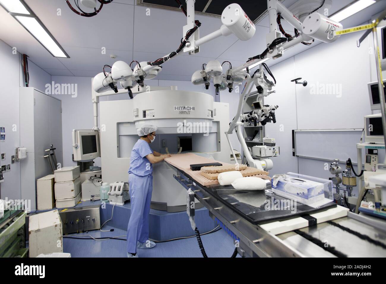 MRI surgery equipment. Surgeon checking a magnetic resonance imaging ...