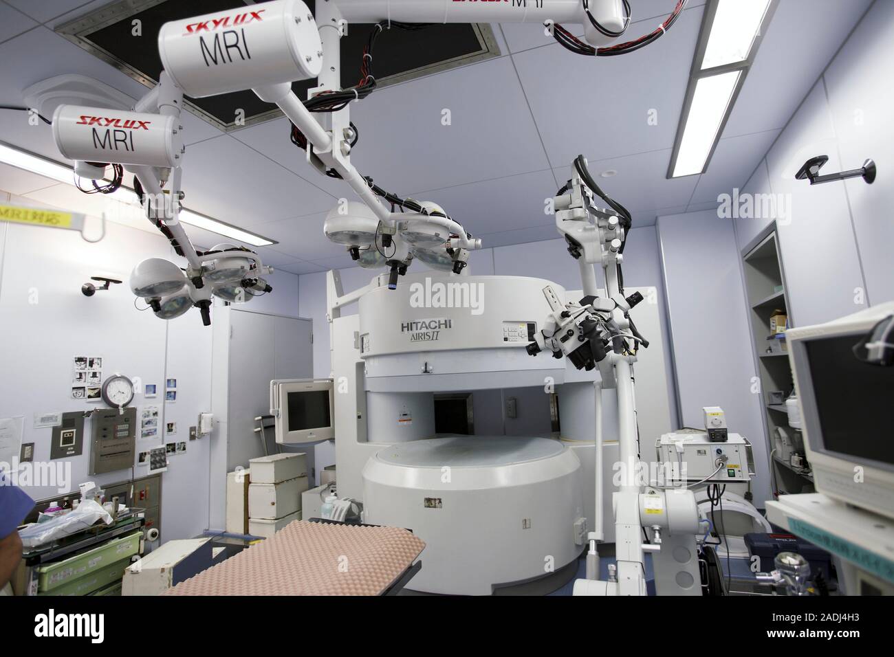 MRI surgery equipment in an operating room. This MRI scanner (centre ...