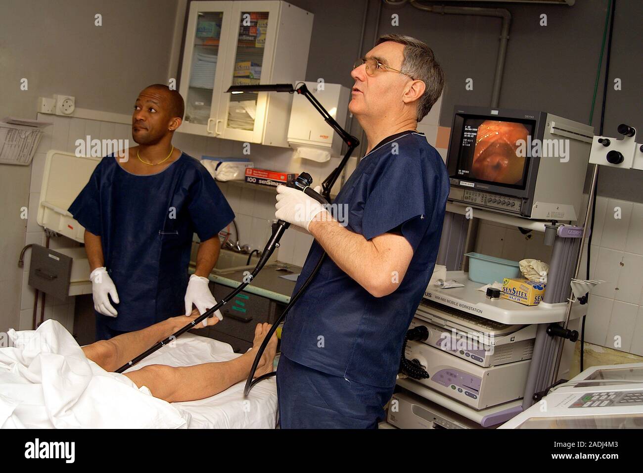 Colonoscopy Surgeons Using A Colonoscope To Examine The Colon Large Intestine Of A Patient A