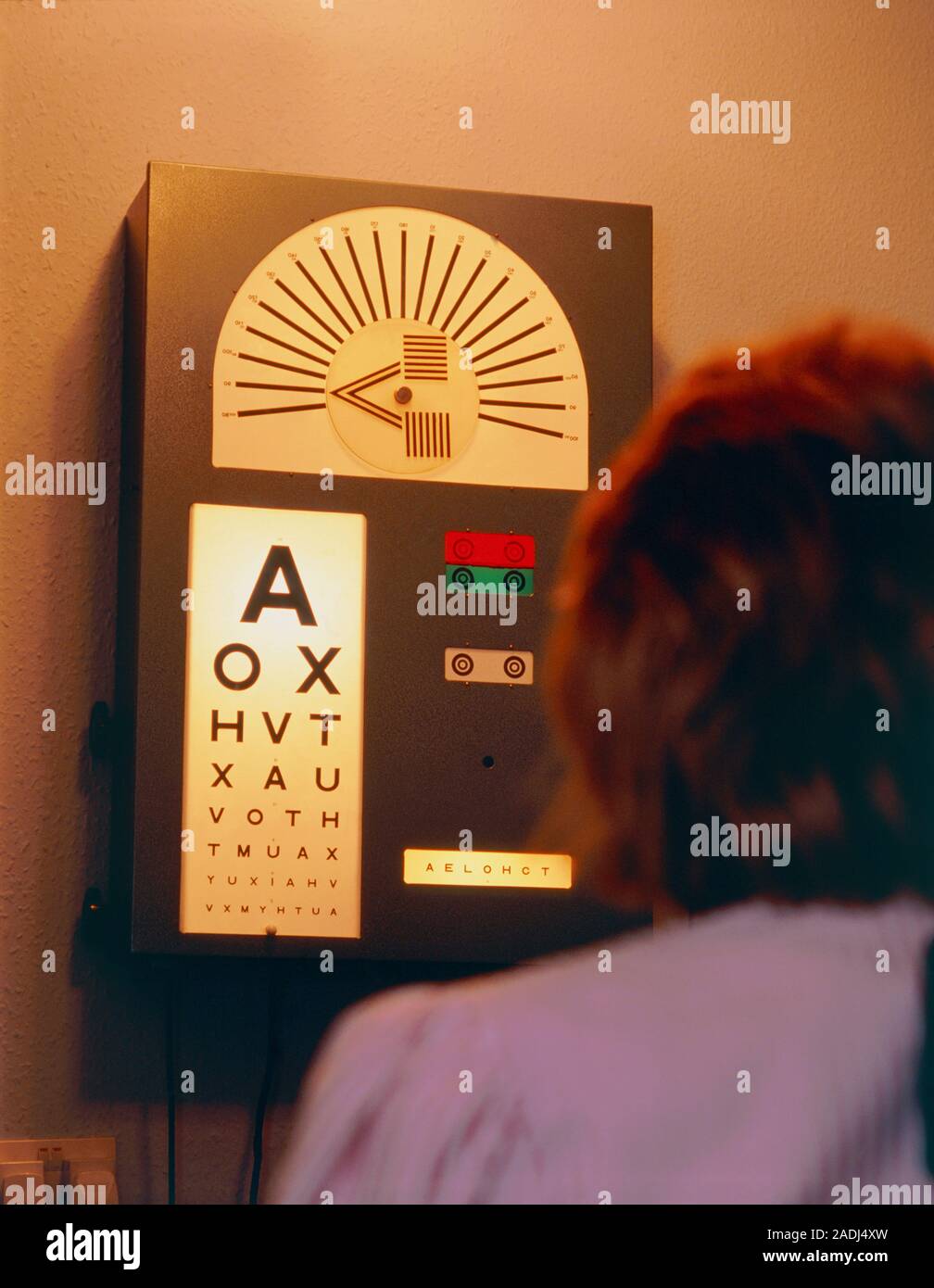 Eye test using the Snellen chart. The visual acuity (sharpness of ...