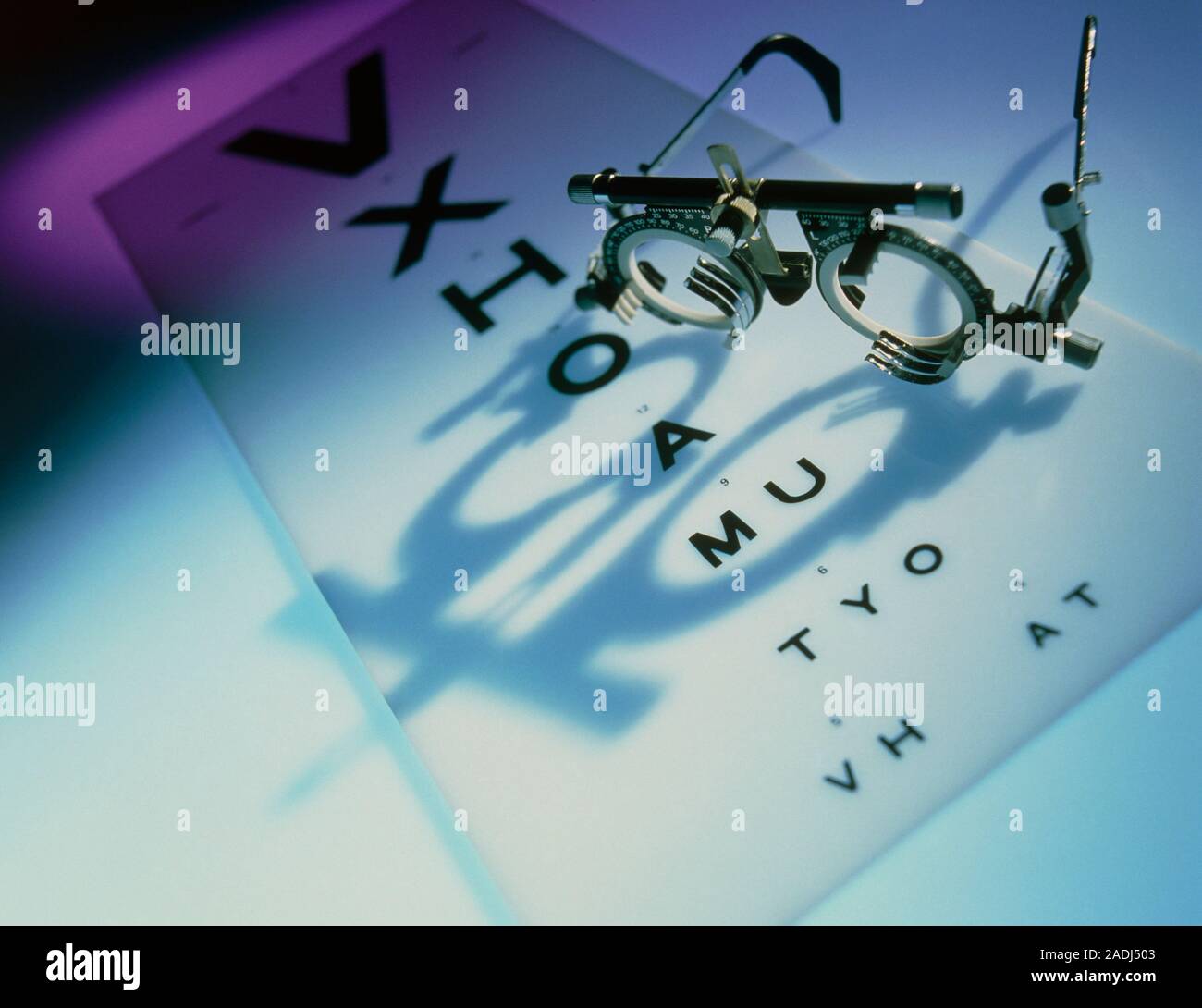 Eye test chart and frames. Ophthalmology test frames casting their ...