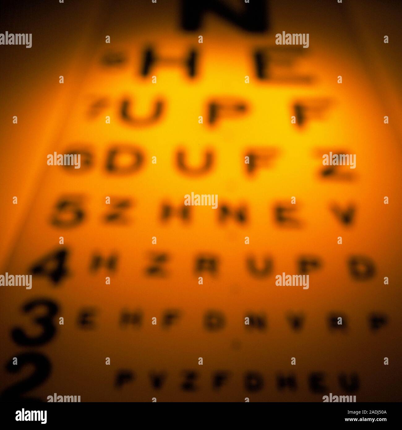 Snellen eye test chart. Blurred view of a Snellen eye test chart used ...