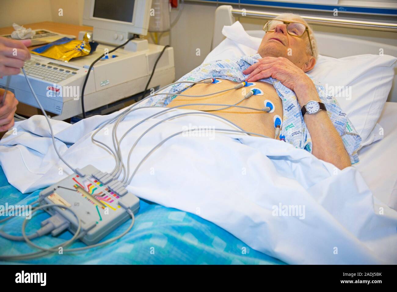 MODEL RELEASED. Heart monitoring. 93-year-old man undergoing an ...