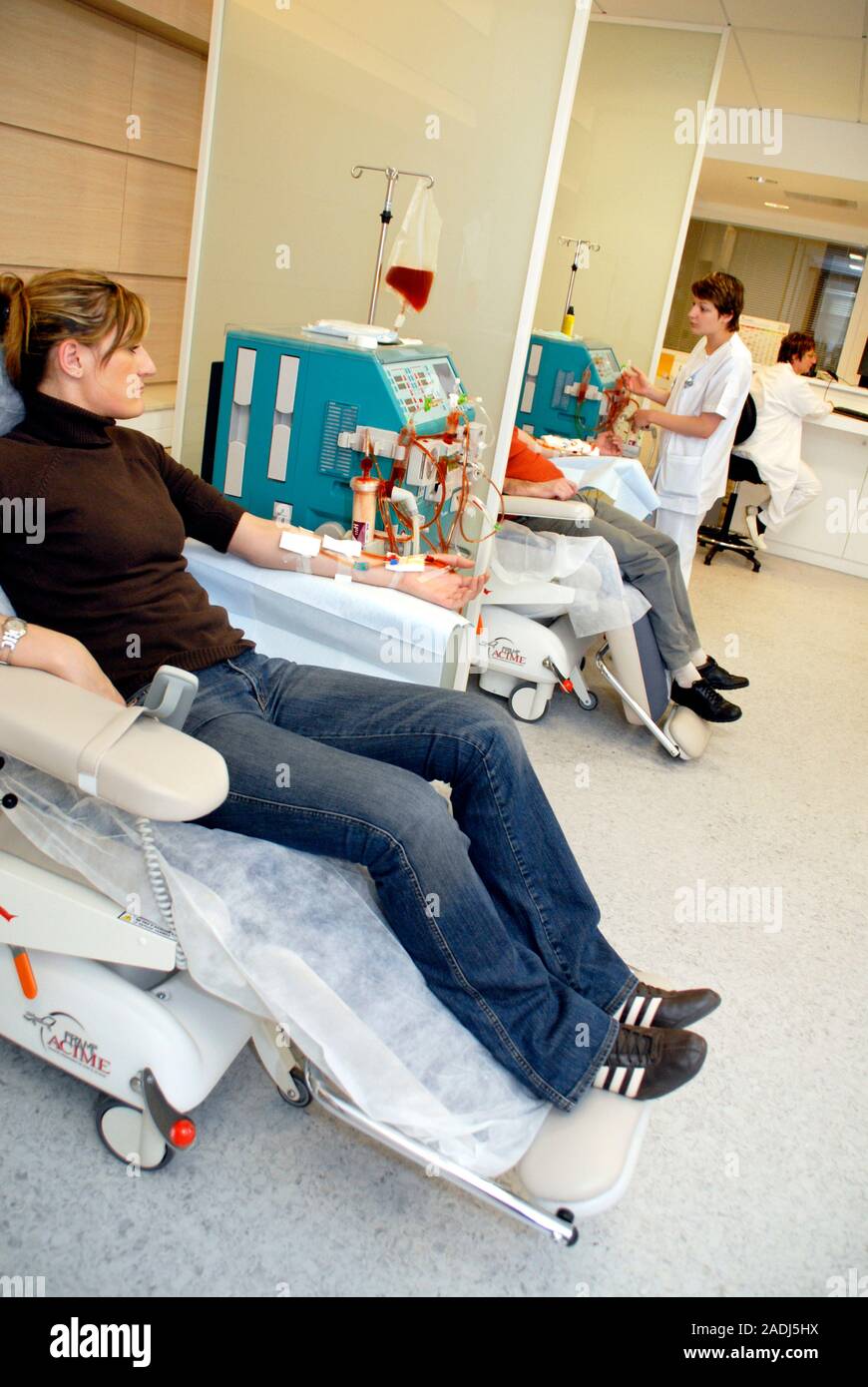 Dialysis unit. Nurse and patients in a dialysis treatment unit. Kidney ...