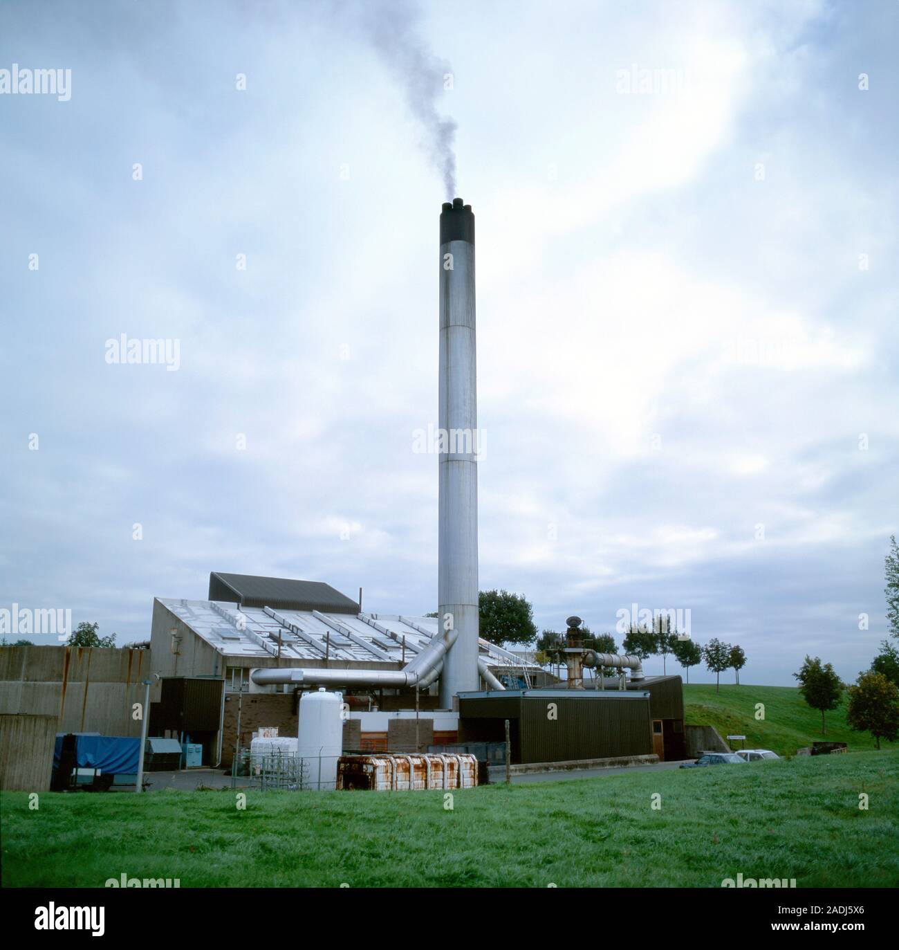 Hospital incinerator. Smoke rising from the top of an incinerator ...