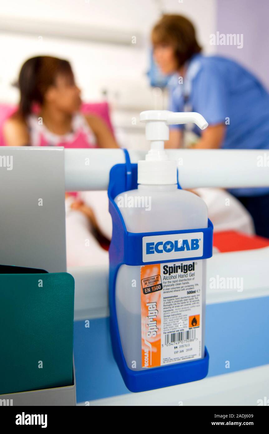 MODEL RELEASED. Hospital hygiene. Alcohol hand gel dispenser on a ...