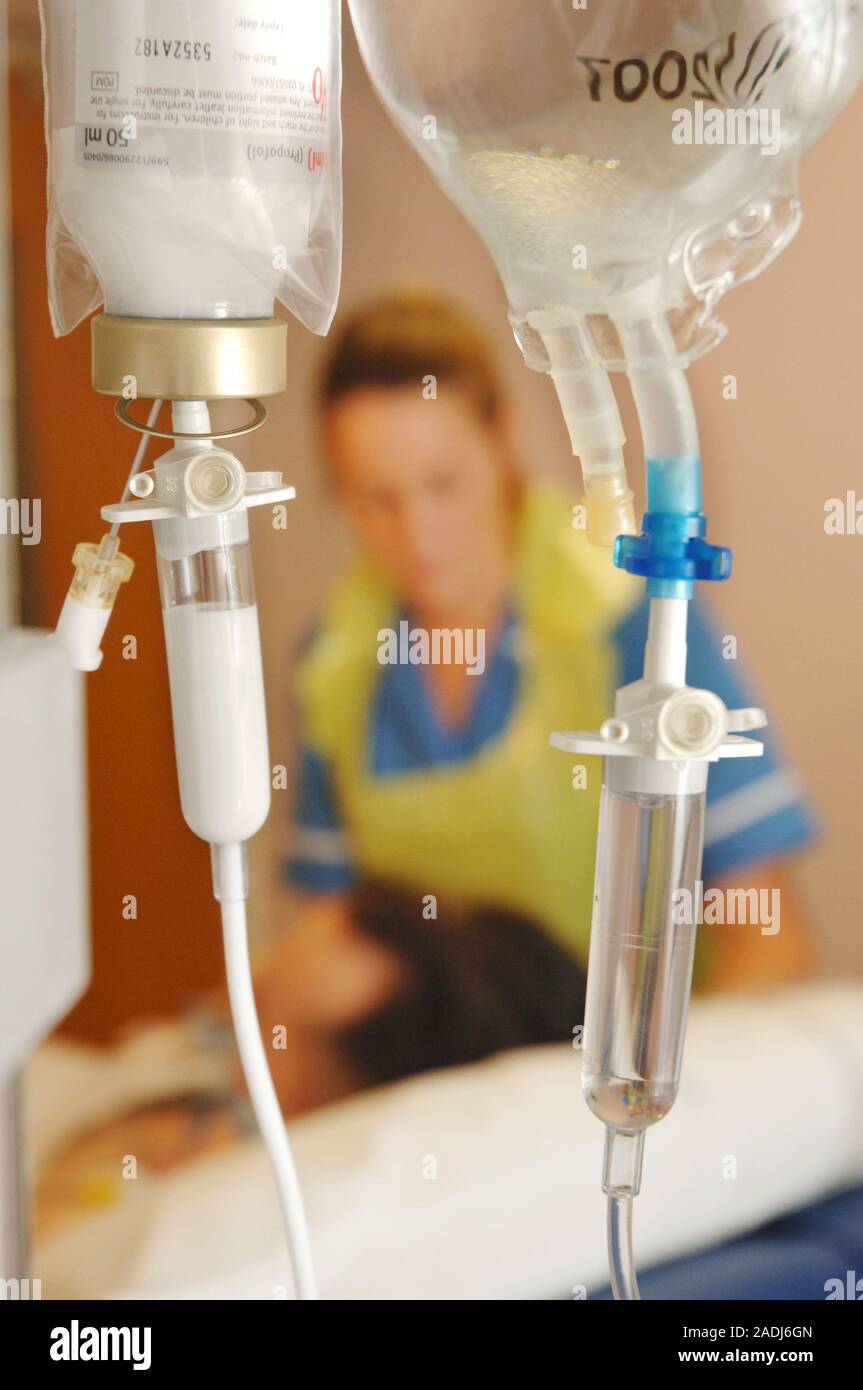 MODEL RELEASED. Intravenous drips in an intensive care unit. A drip is ...