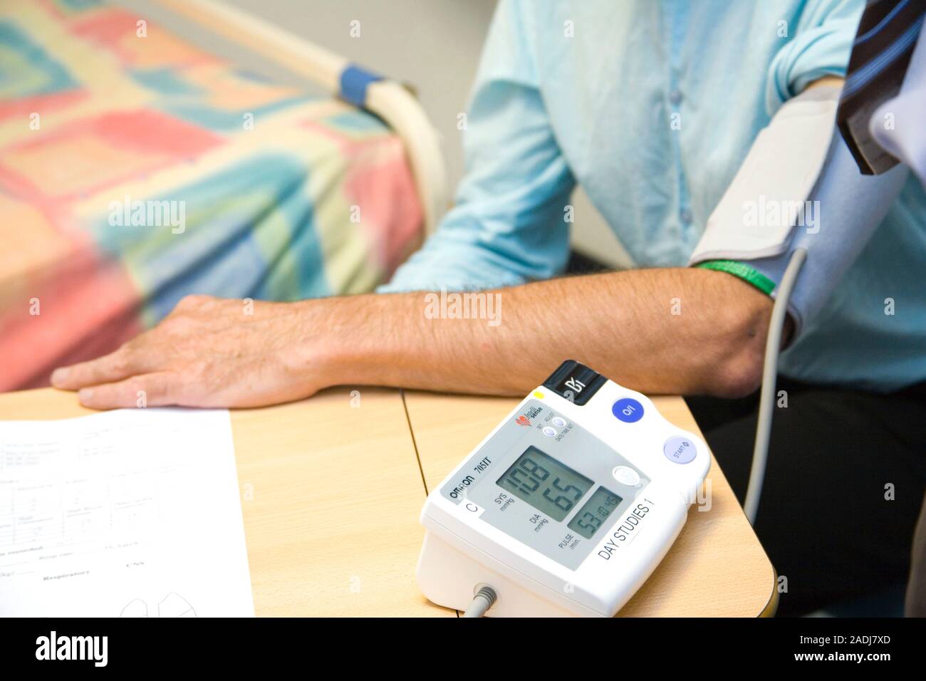 MODEL RELEASED. Blood pressure test. Healthy patient having his blood ...