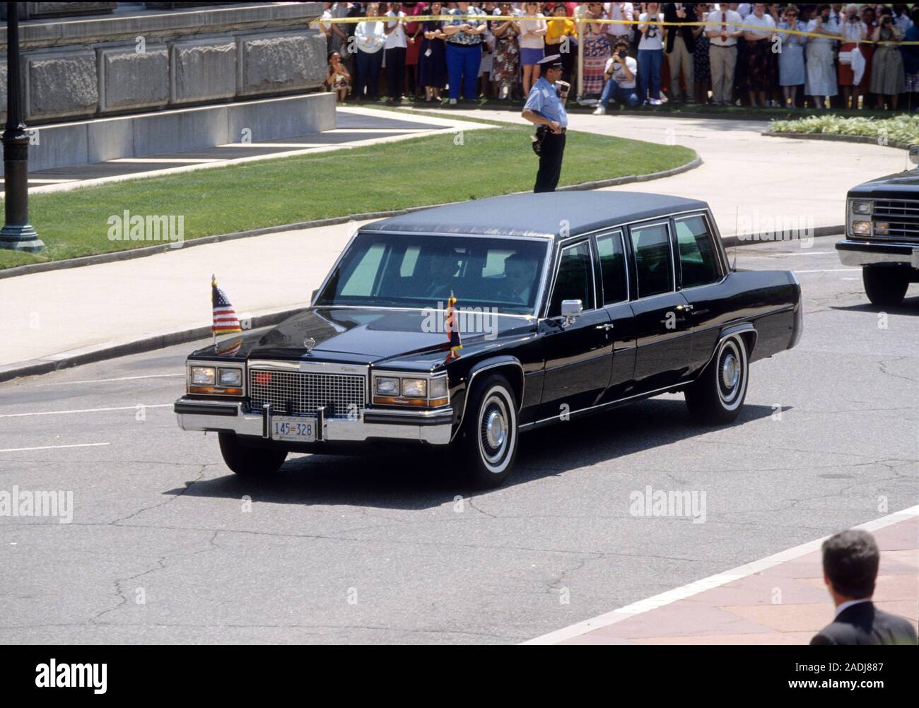 HM Queen Elizabeth II is transported in a Presidential Cadillac car ...