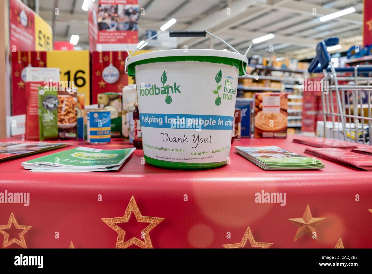 A Charity Money Bucket For Donations At The Tesco Supermarket National a-charity-money-bucket-for-donations-at-the-tesco-supermarket-national
