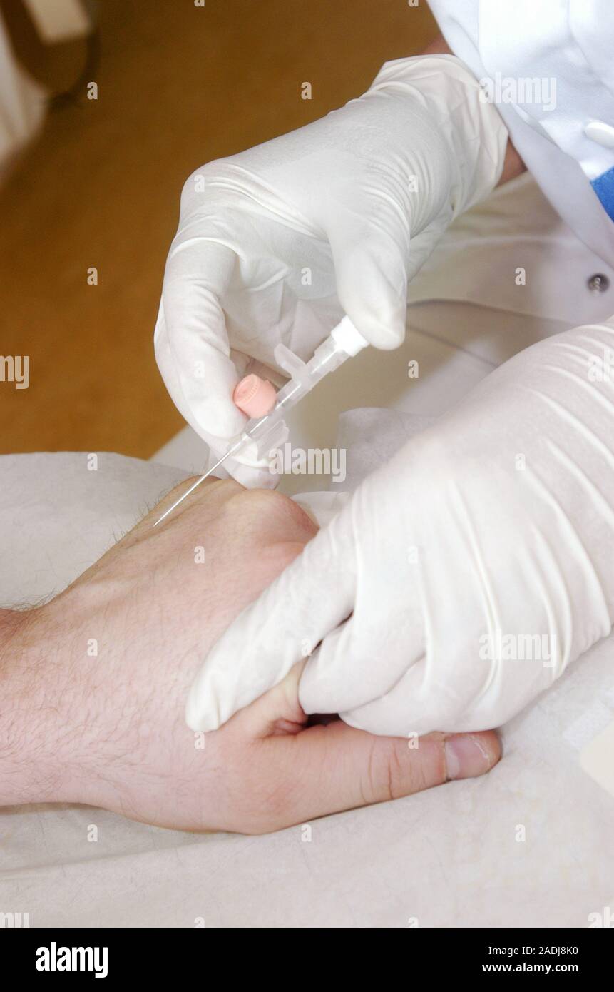 Inserting an intravenous catheter. Image 1 of 4. This catheter will be ...