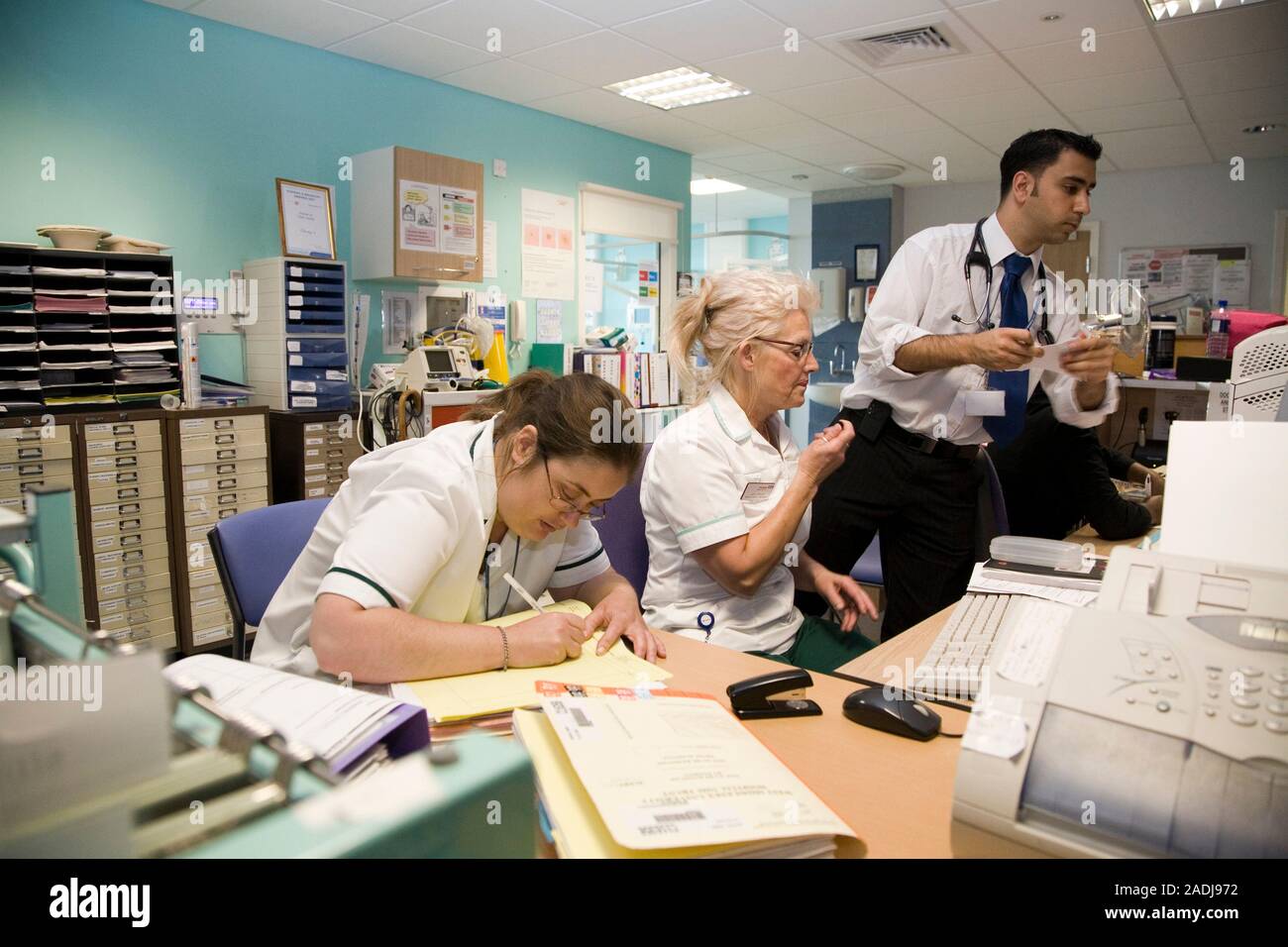 MODEL RELEASED. Hospital administration. Staff working in a hospital ...