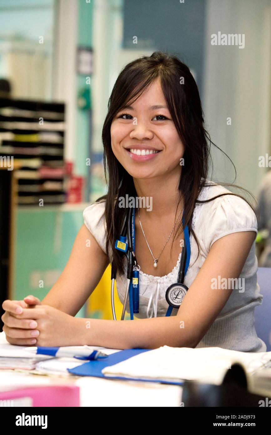 MODEL RELEASED. Hospital doctor working at a workstation Stock Photo ...