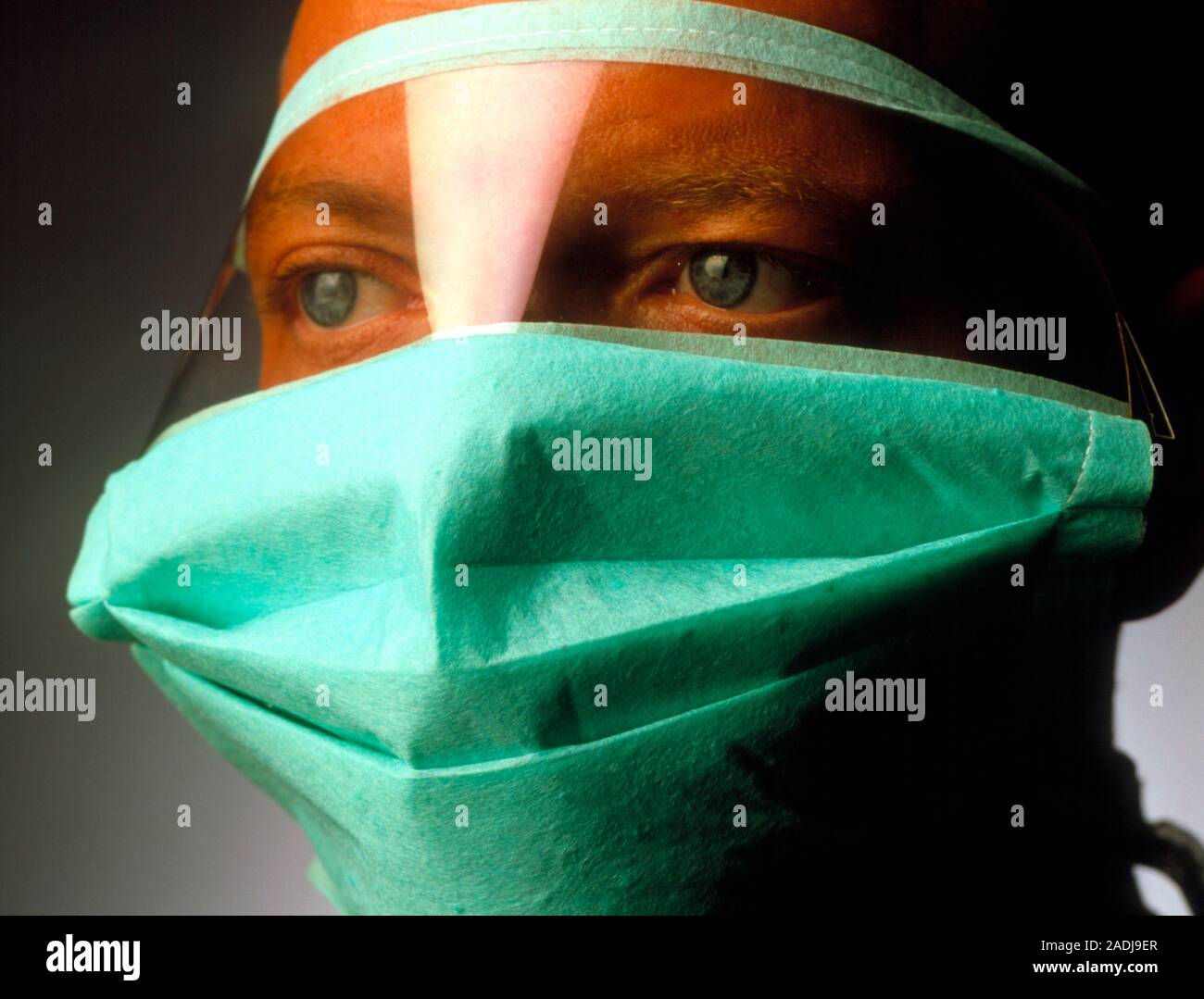 MODEL RELEASED. Hospital surgeon. Close-up of the face of a male ...
